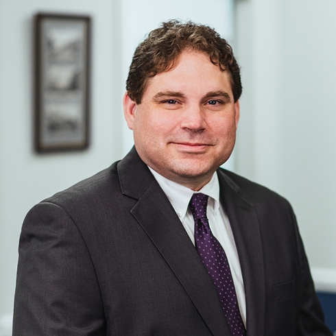 John T. Knapp | Simon, O’Brien, & Knapp